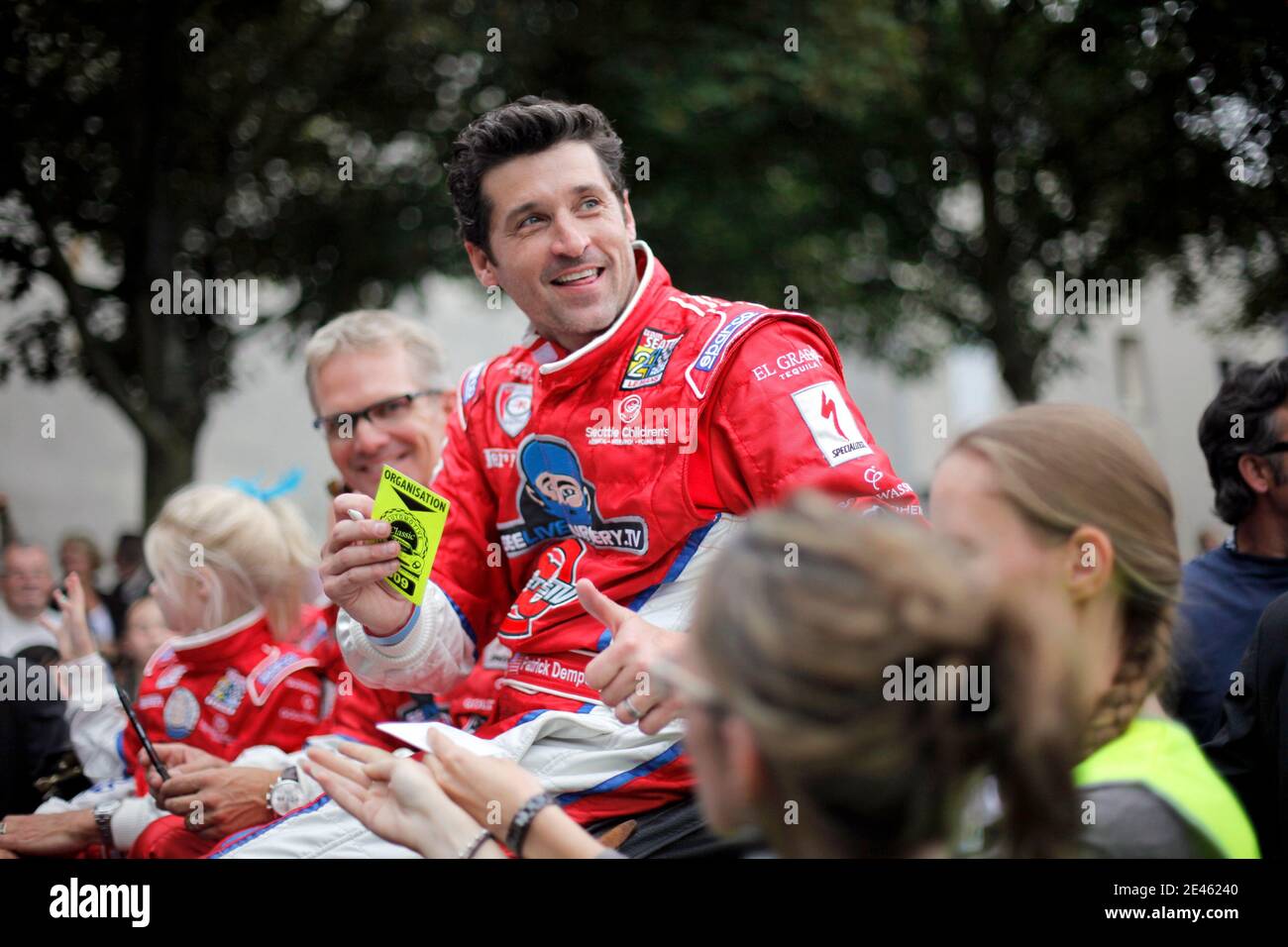 Actor Patrick Dempsey signs autographs to his numerous fans during the ...