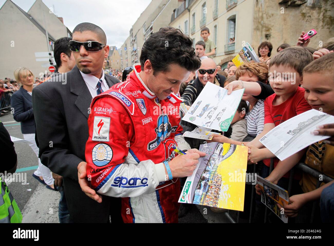 Actor Patrick Dempsey signs autographs to his numerous fans during the ...