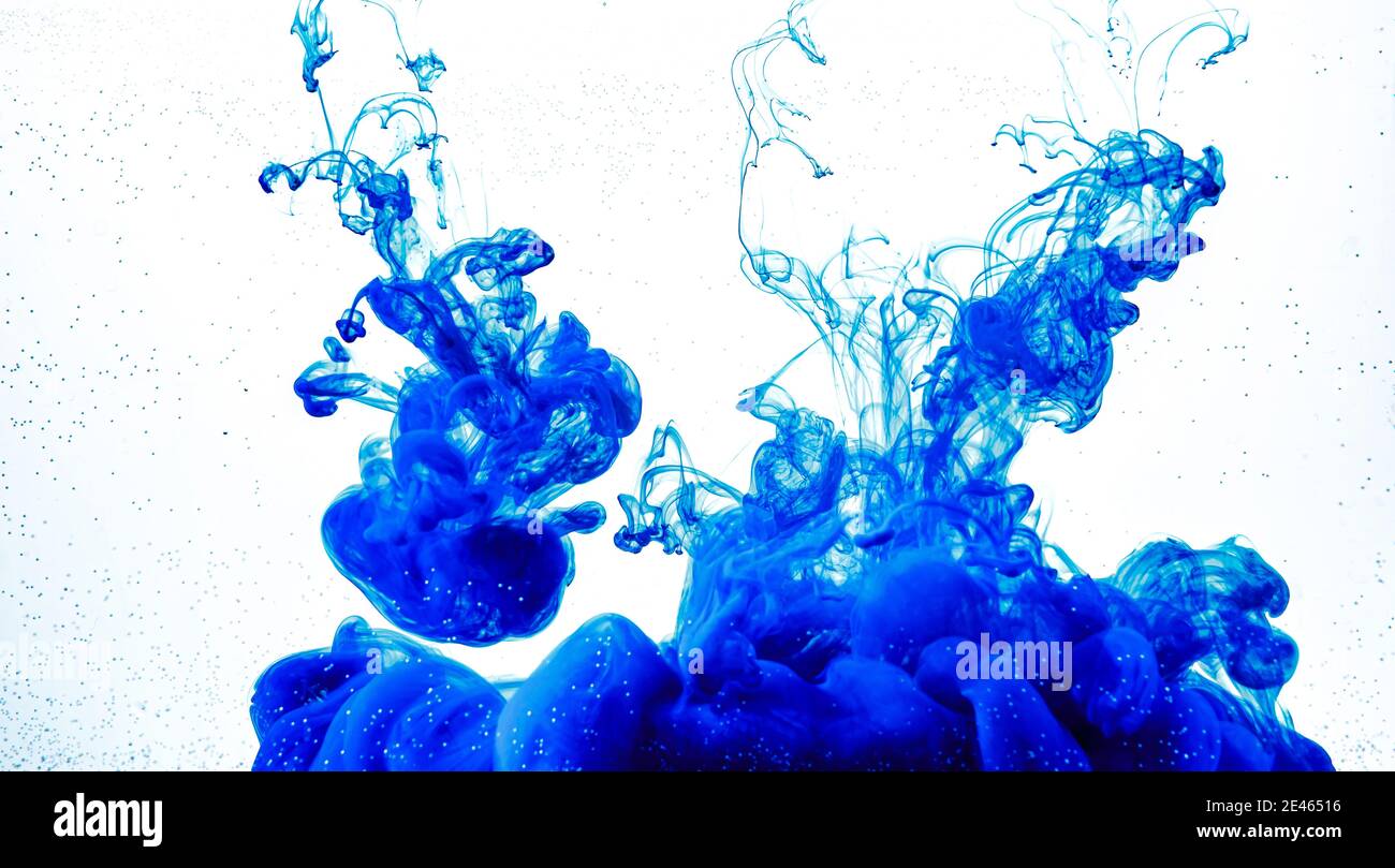 Blue ink in water abstract background on white background Stock Photo ...