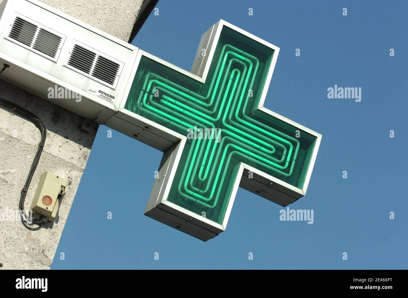 Pharmacy sign board in France. Photo by Philippe Montigny/ABACAPRESS ...