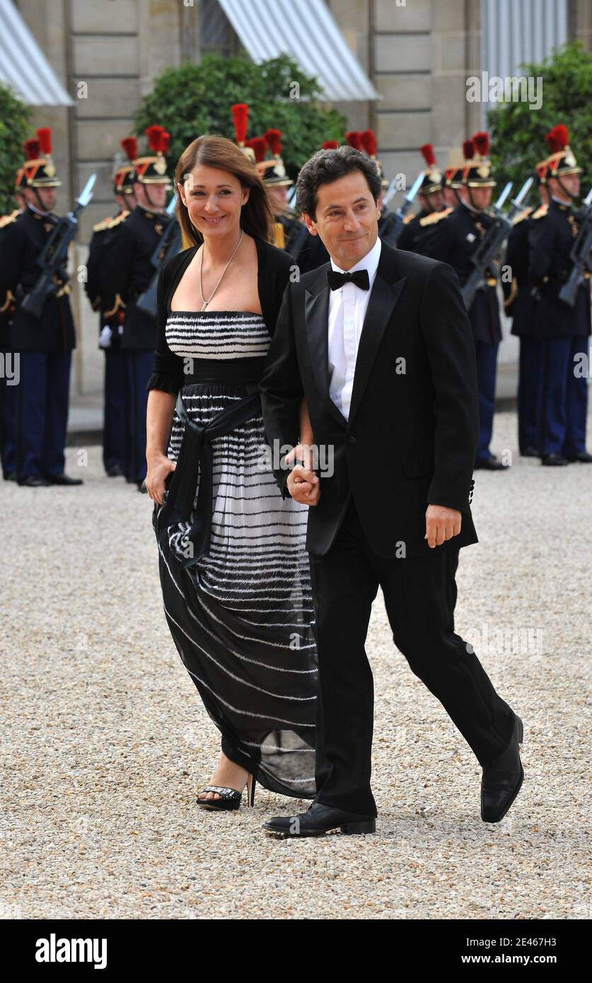 Daniela Lumbroso and her husband Eric Ghebali arrive for a state dinner ...