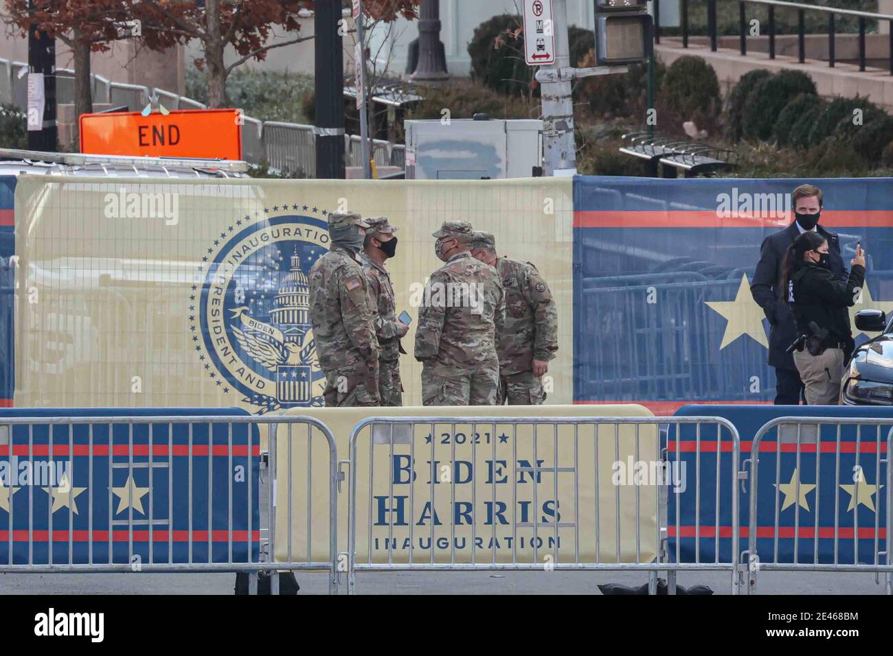 Members of the military standing at the parade route during ...
