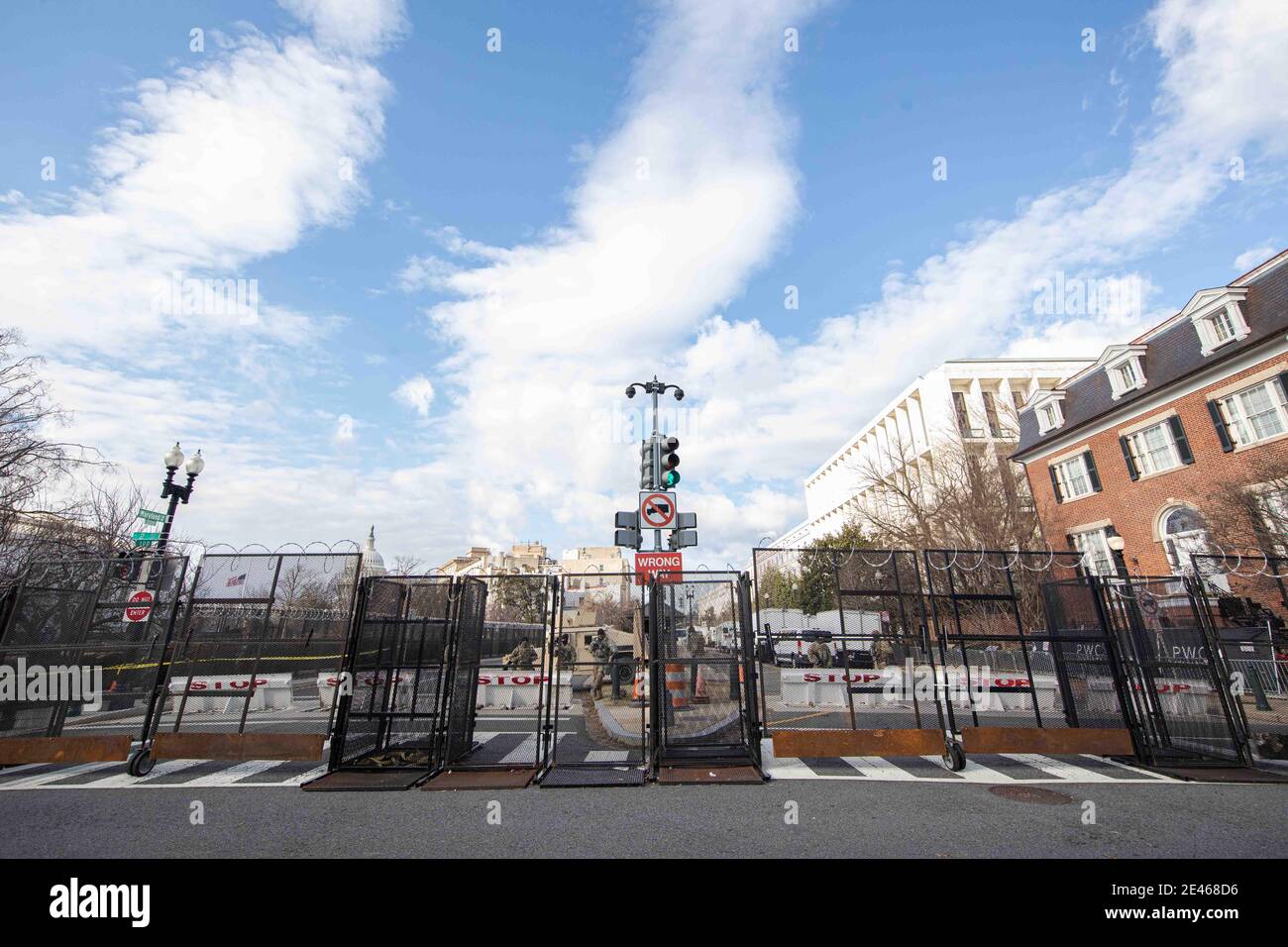 Barbed wire fence secure the perimeter of the Capitol grounds during ...