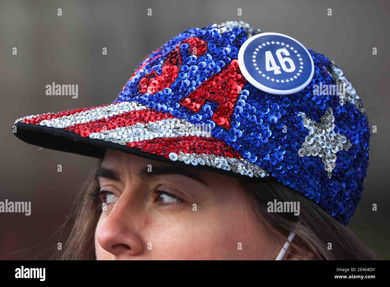 A Biden supporter is seen wearing a number 46 hat during Inauguration ...