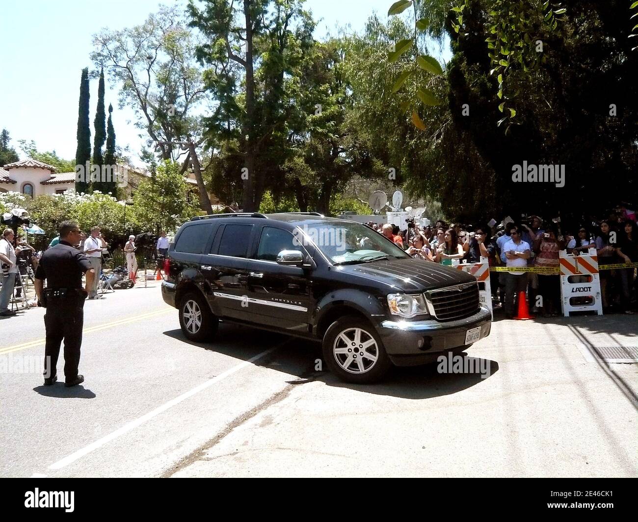 Michael Jackson's fans and media outside the Jackson family compound in ...
