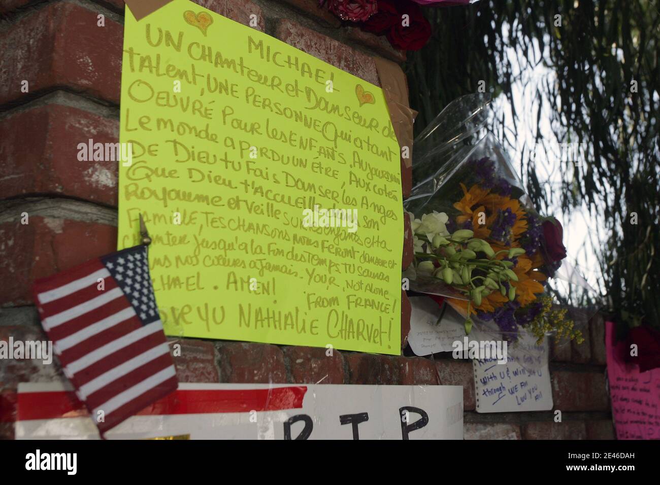 Fans and Media wait outside the entrance to the Jackson family compound ...