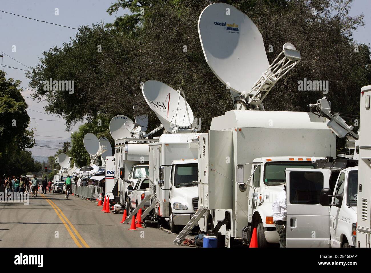 Fans and Media wait outside the entrance to the Jackson family compound ...
