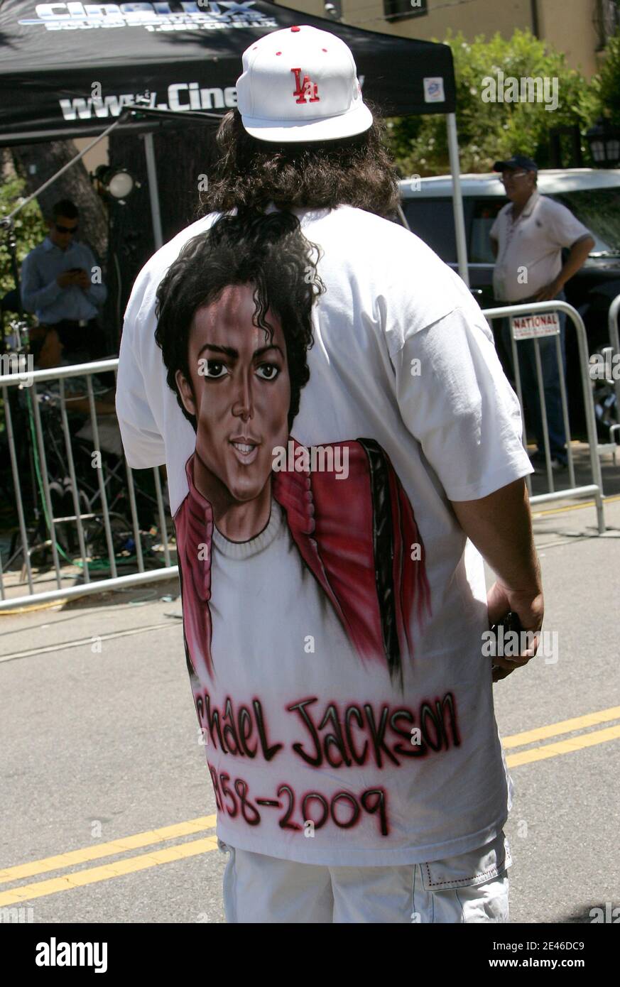 Fans and Media wait outside the entrance to the Jackson family compound ...