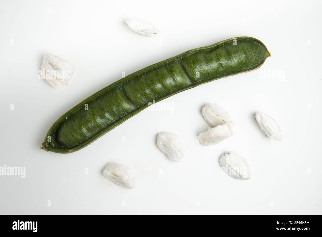 Isolated top view of guaba pod and seeds on white background Stock ...
