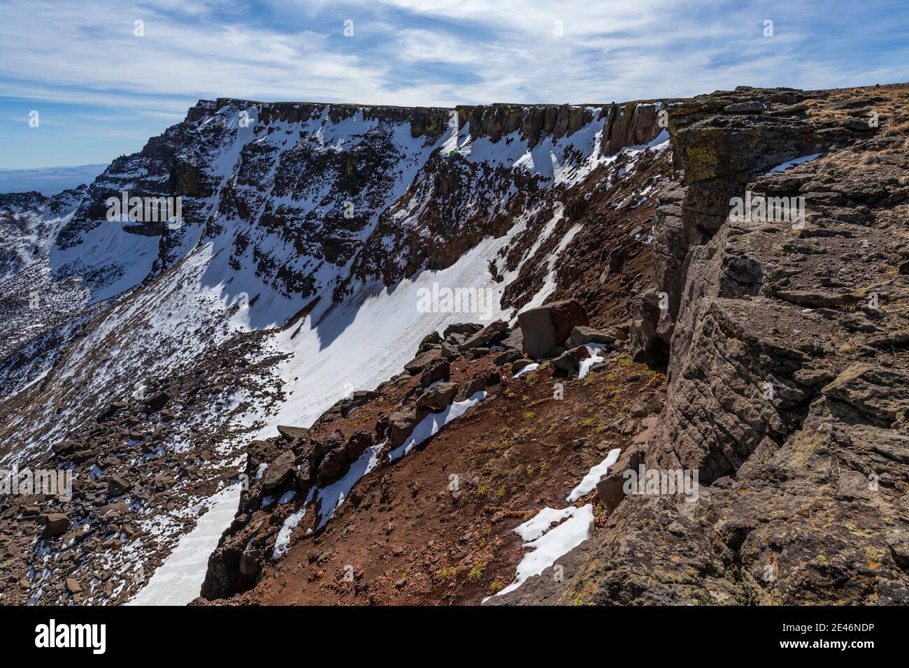 Snowy basalt outcrops at east rim of Steens Mountain, Oregon, USA Stock ...