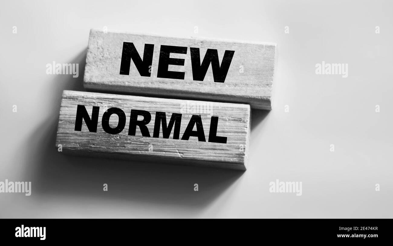 New normal words on wooden blocks. Business economy environment ...