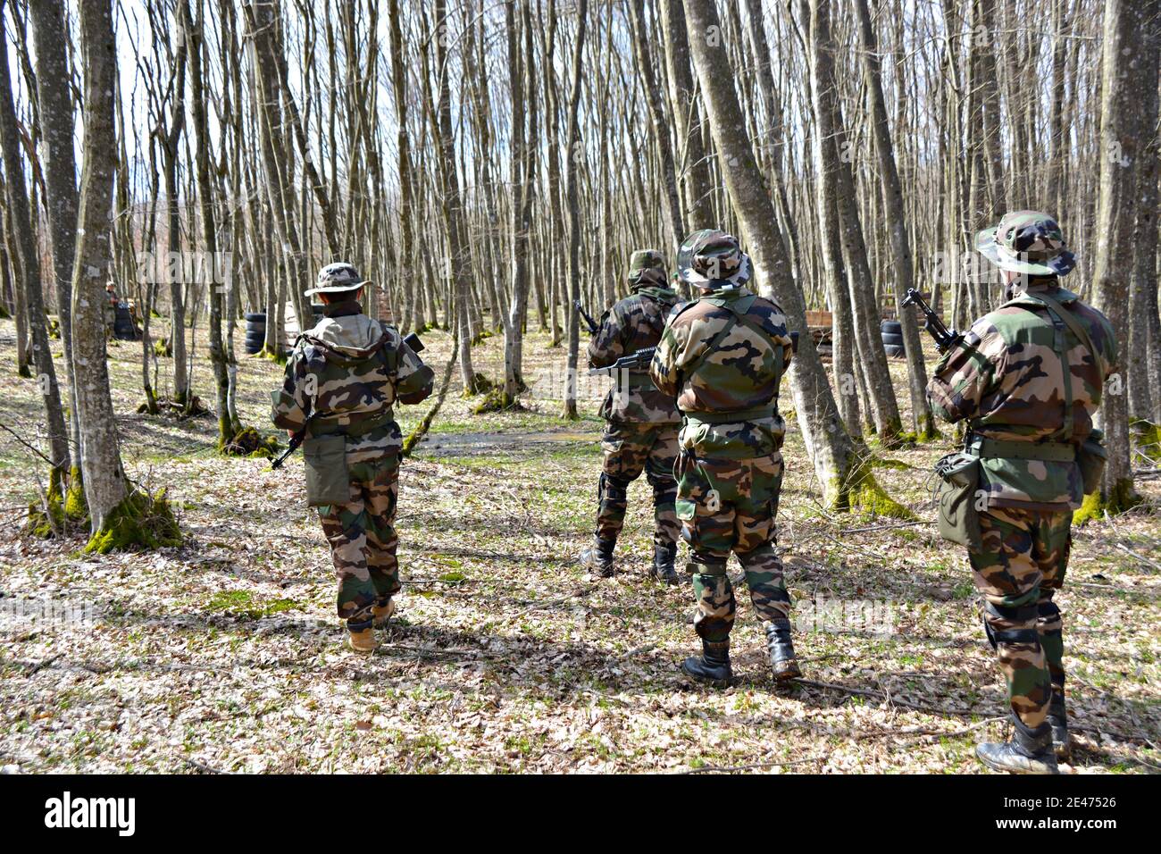 Group of special forces soldiers during the raid in a forest Stock ...