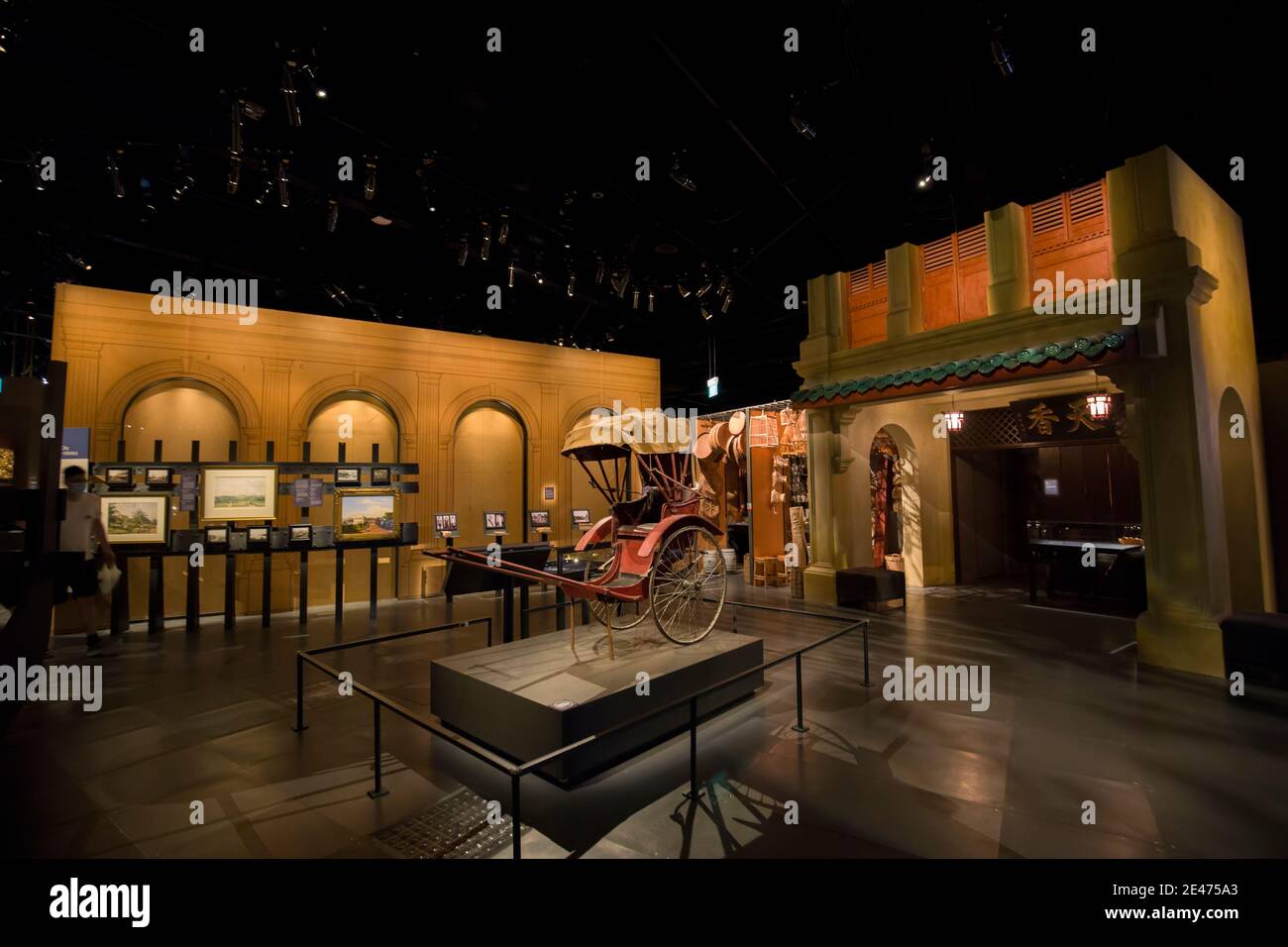 the late 19th century rickshaw in national museum of Singapore. It ...