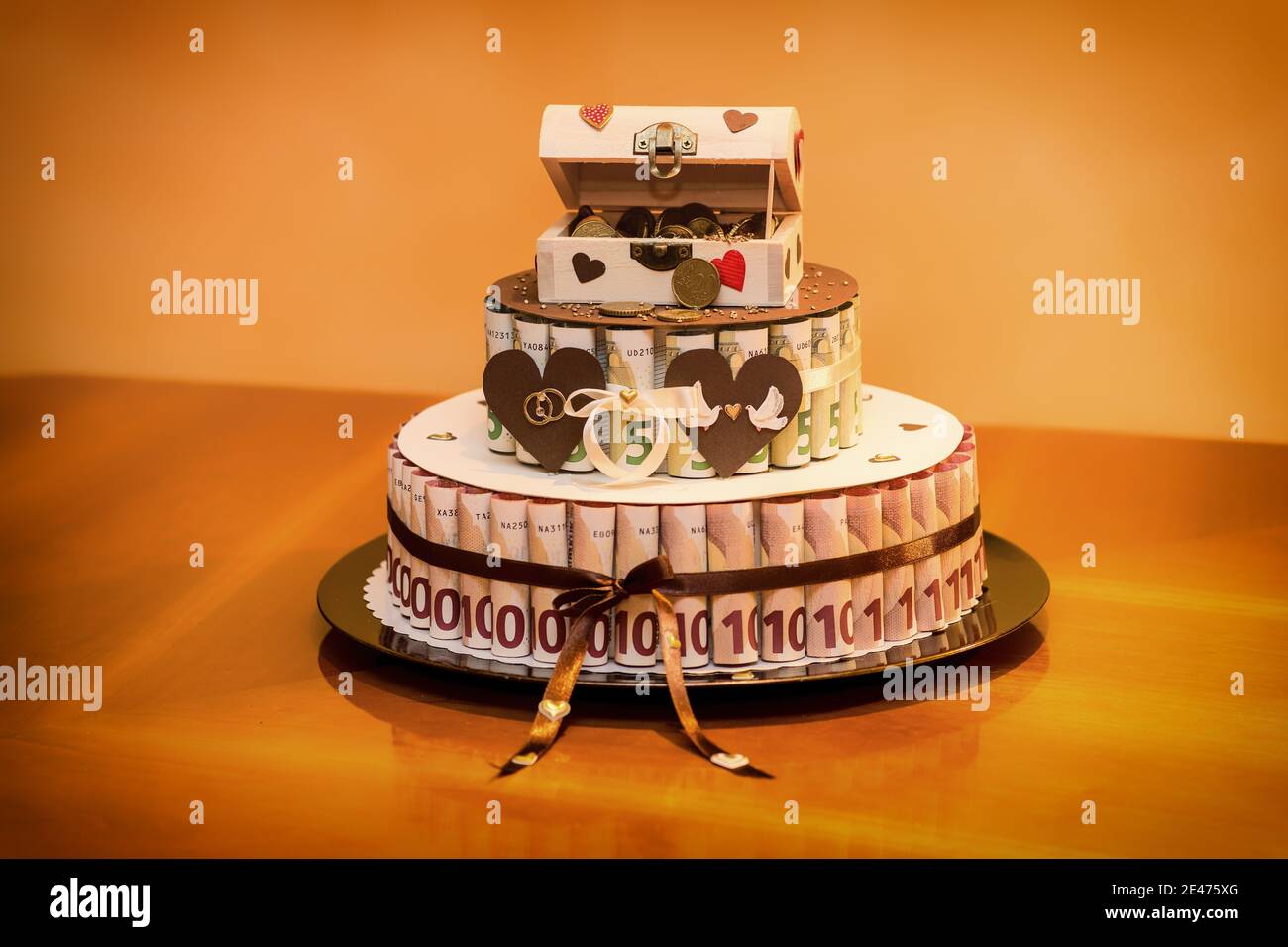wedding cake made of money , treasure chest Stock Photo - Alamy