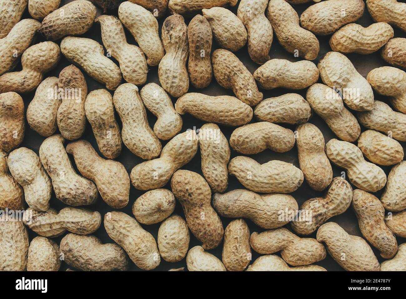 Unpeeled brown peanuts on hi-res stock photography and images - Alamy