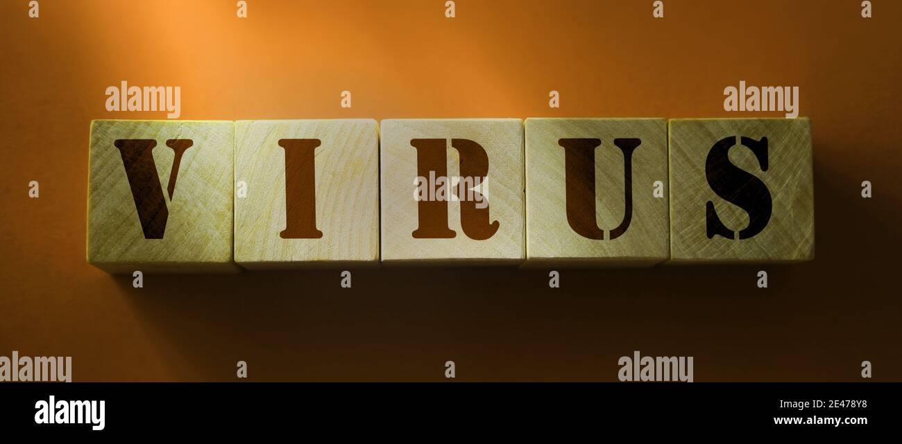 Word VIRUS made with wooden blocks. Healthcare medical concept Stock ...