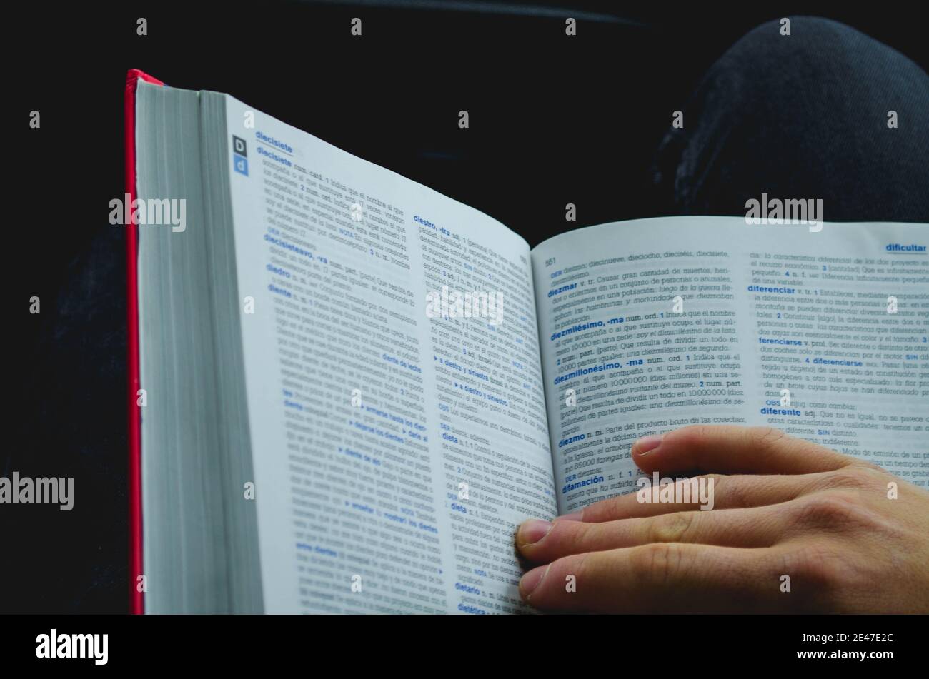 Hand holding book close view hi-res stock photography and images - Alamy