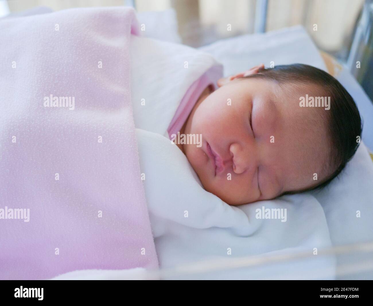 Asian cute baby newborn girl sleeping Stock Photo - Alamy