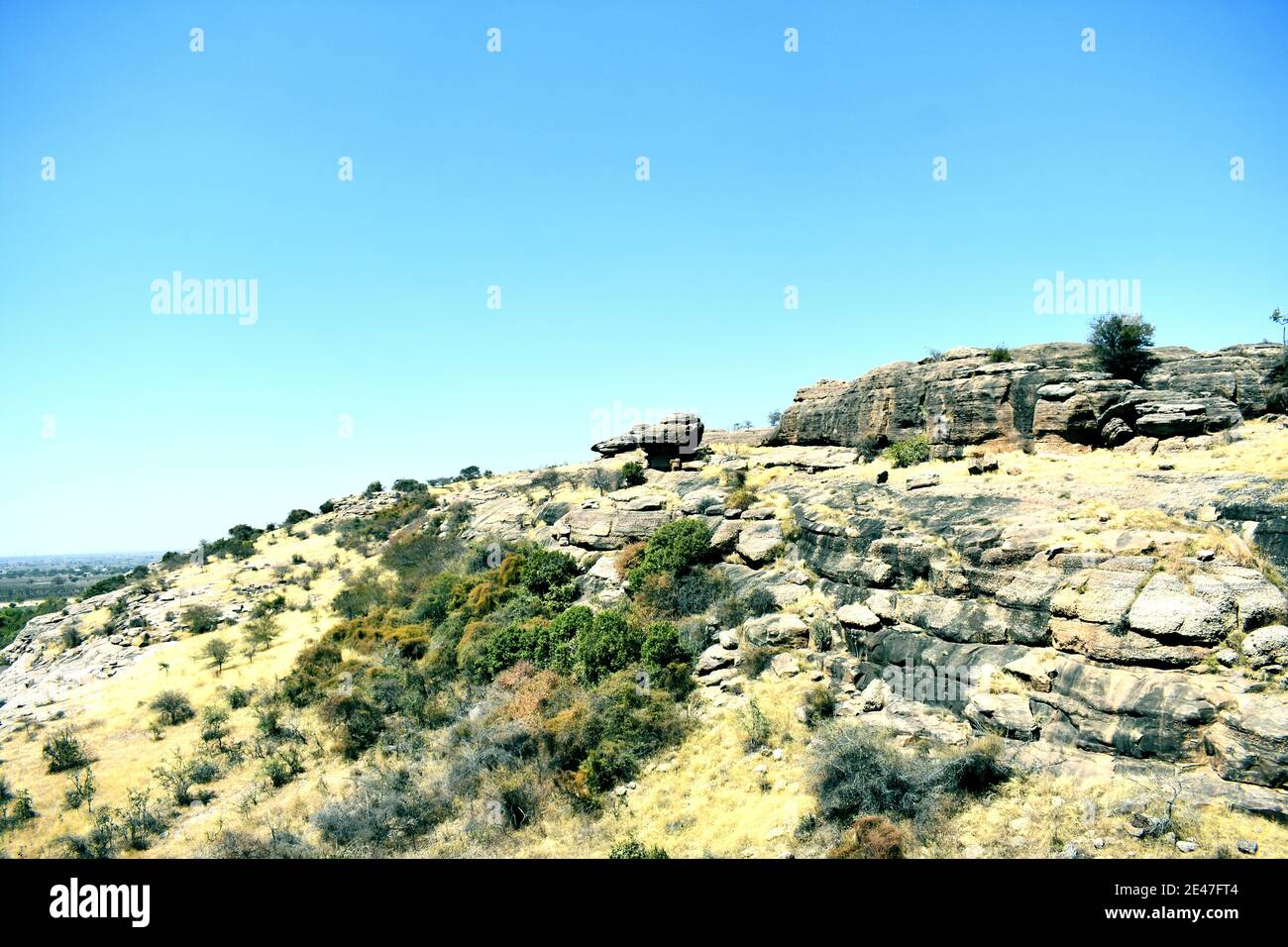 Dry wild landscape with mountains and hills Stock Photo - Alamy