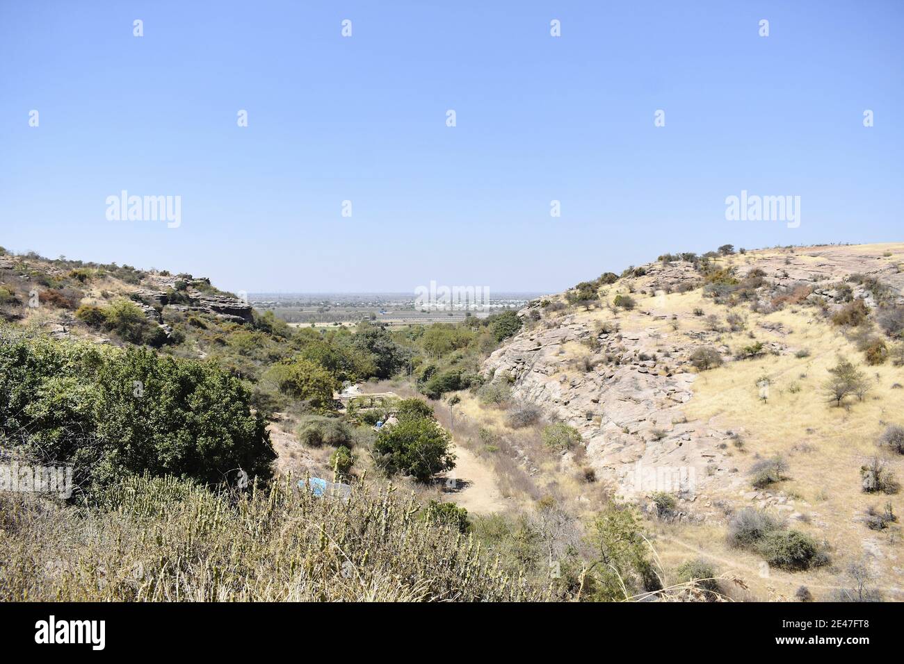 Dry wild landscape with mountains and hills Stock Photo - Alamy