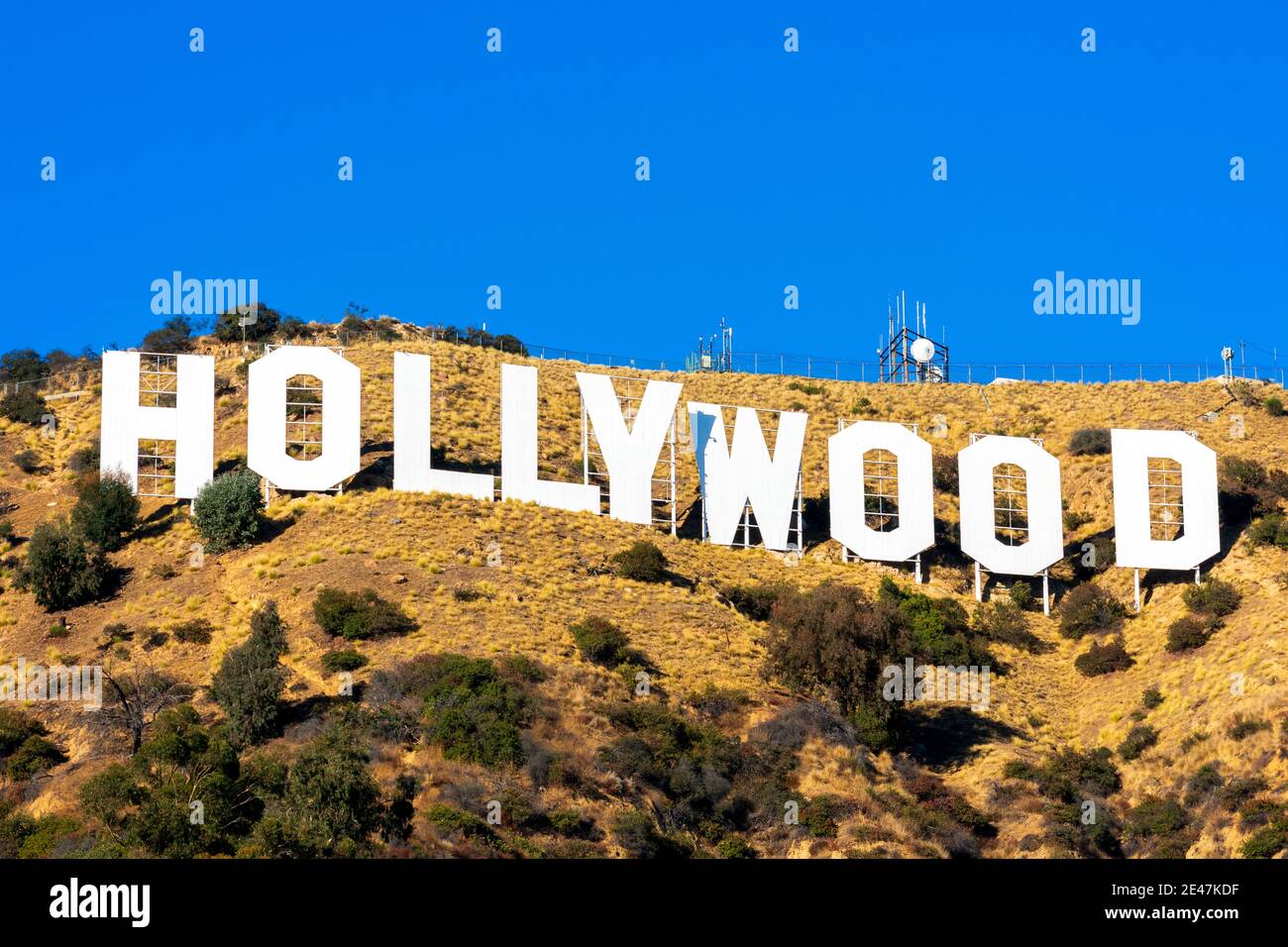 Hollywood sign white letters under blue sky on Mount Lee. The Hollywood ...