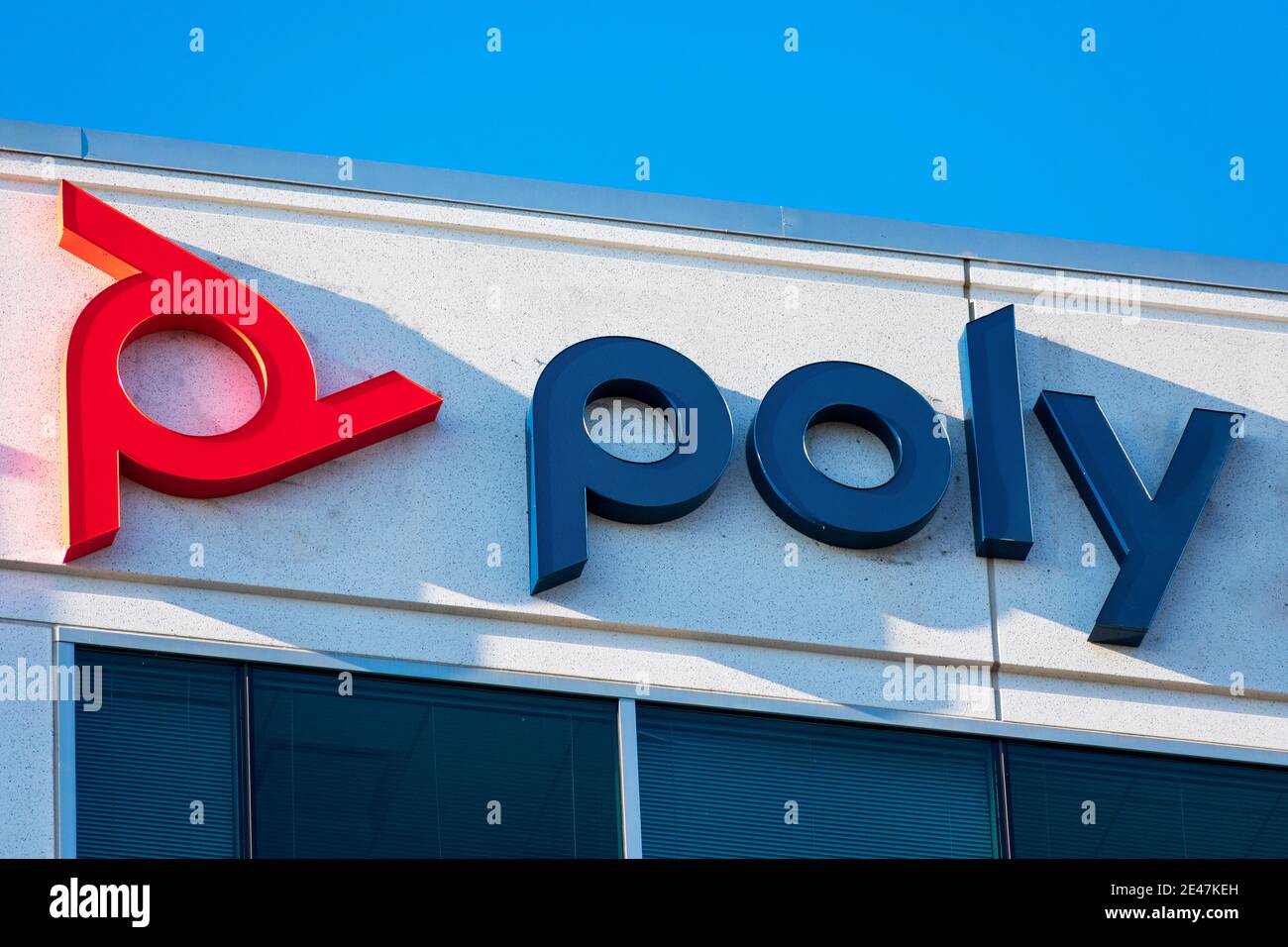 Poly, logo on headquarters building. Poly is an electronics company ...