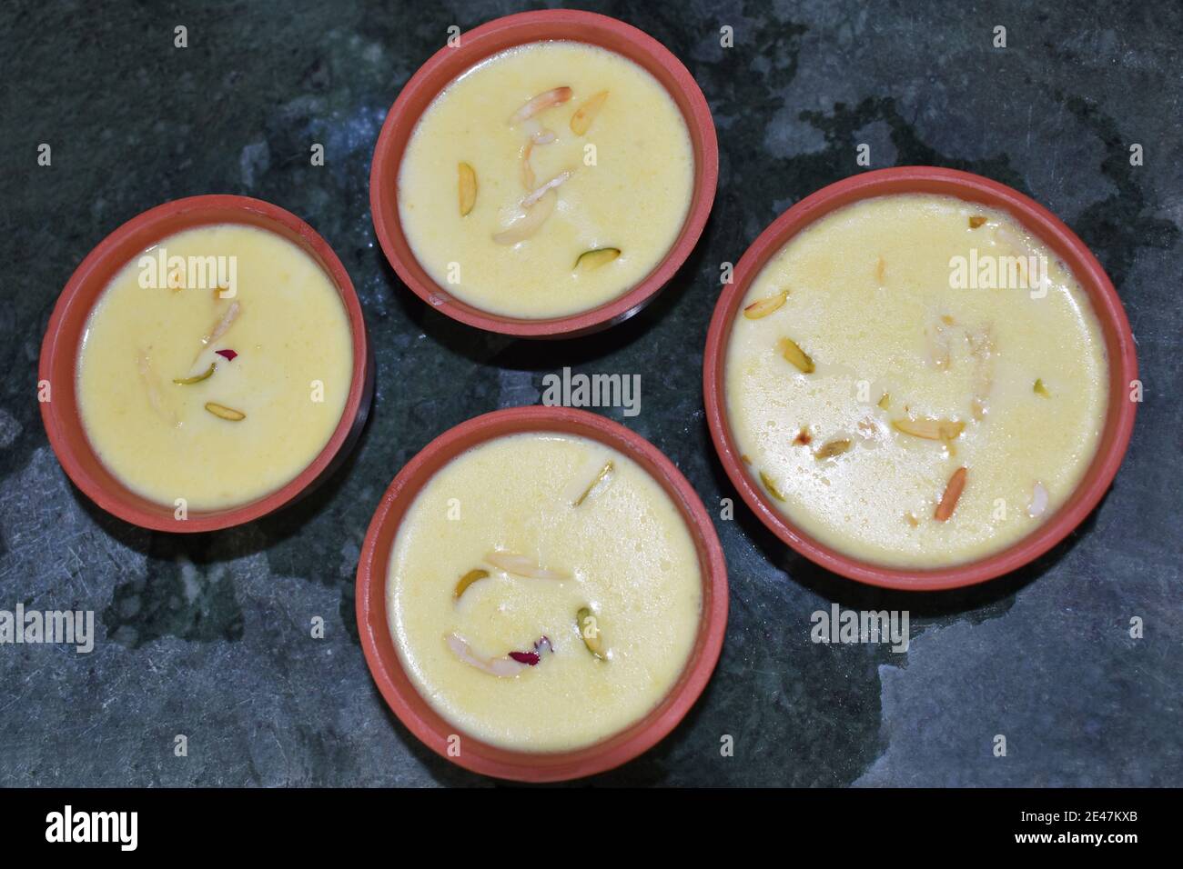 Homemade Rabri a North Indian sweet made of milk, cardamon and nuts ...