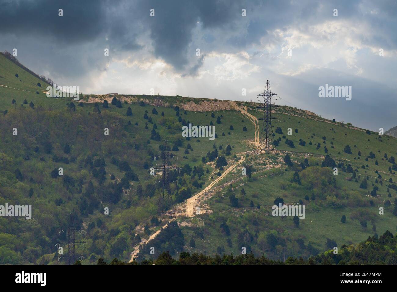 Beautiful natural park high tension lines and pylons Stock Photo - Alamy