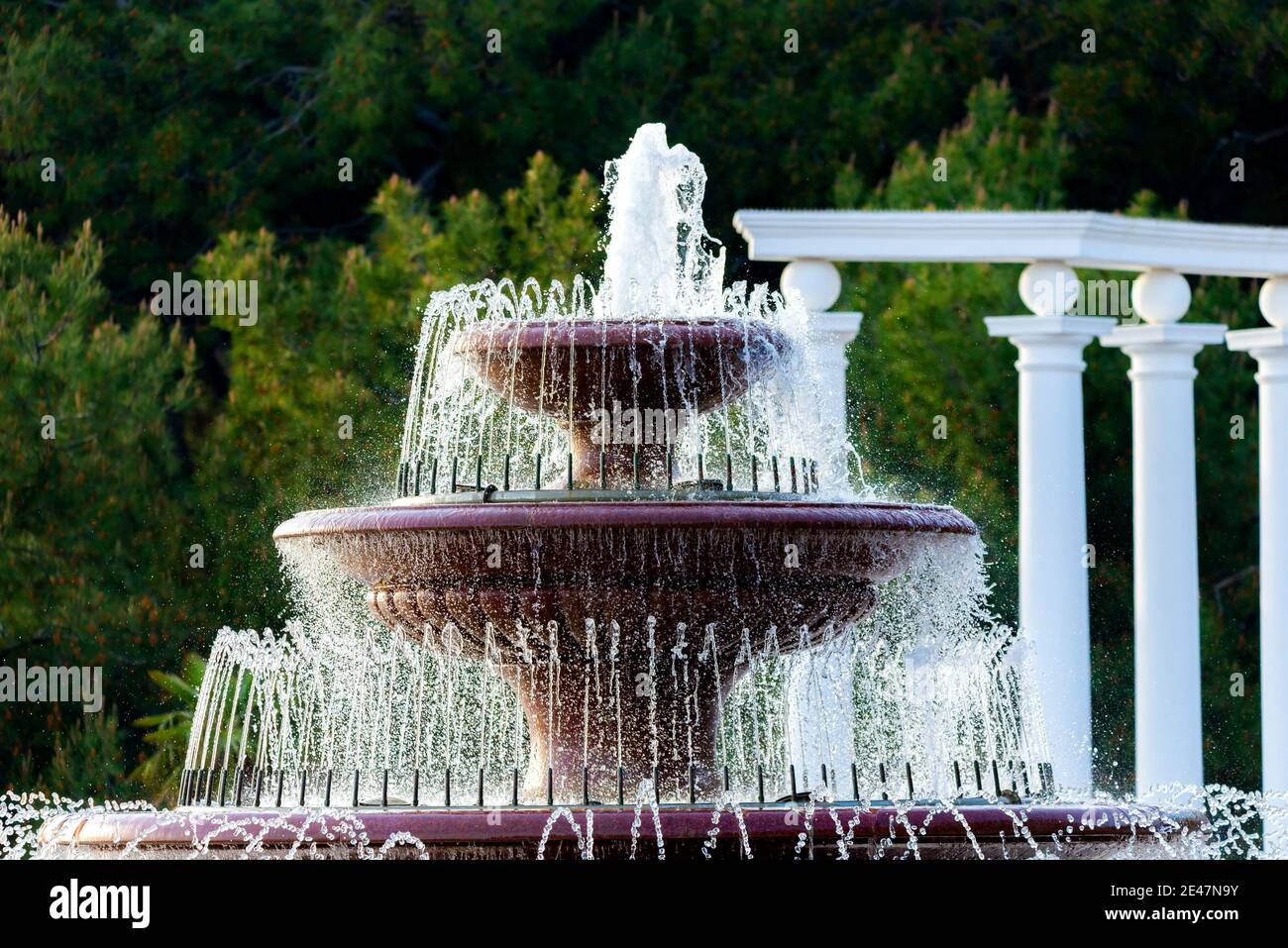 Detail of an old classic style stone fountain with flowing water Stock ...