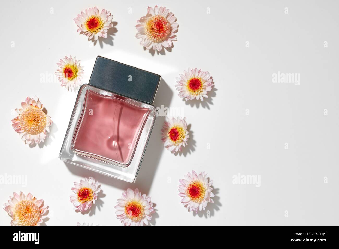 Bottle fragrance surrounded flower hi-res stock photography and images ...