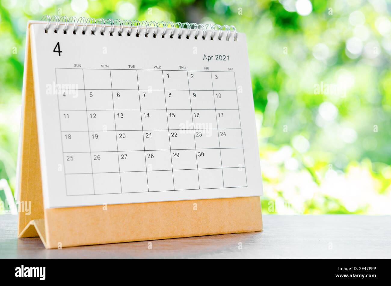 April 2021 Calendar desk for organizer to plan and reminder on wooden ...