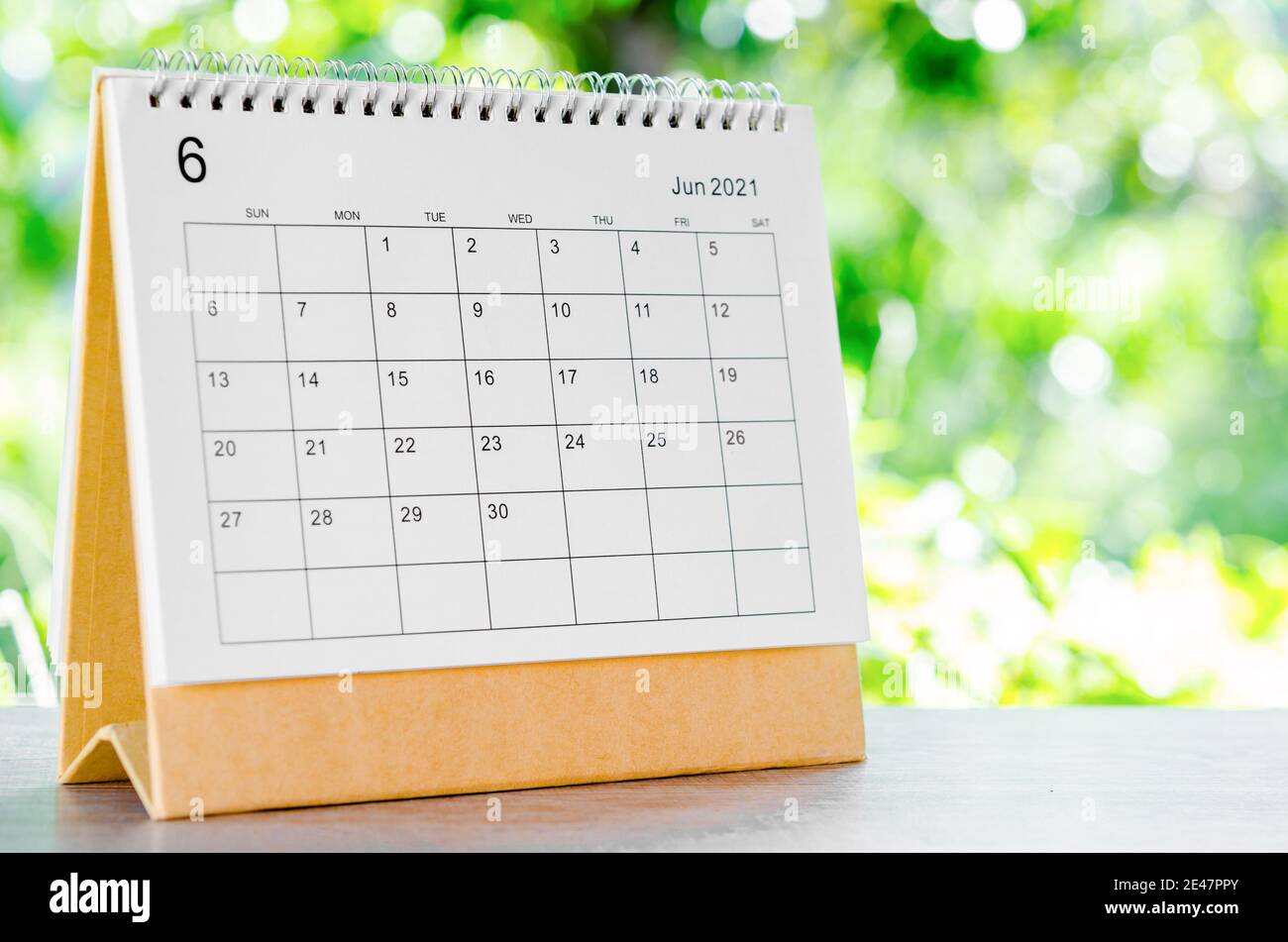 June 2021 Calendar desk for organizer to plan and reminder on wooden ...