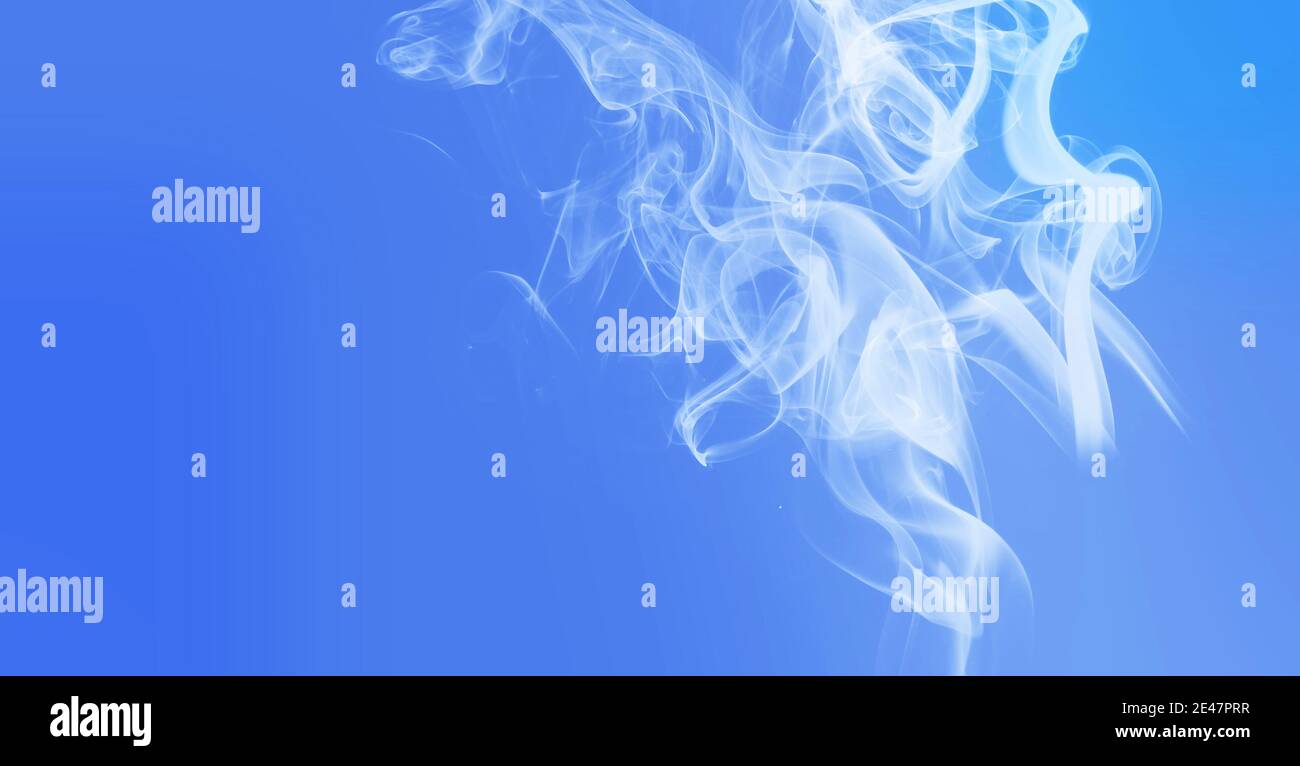 Beautiful dreamy sky with soft pink and mint clouds and smoke over them ...