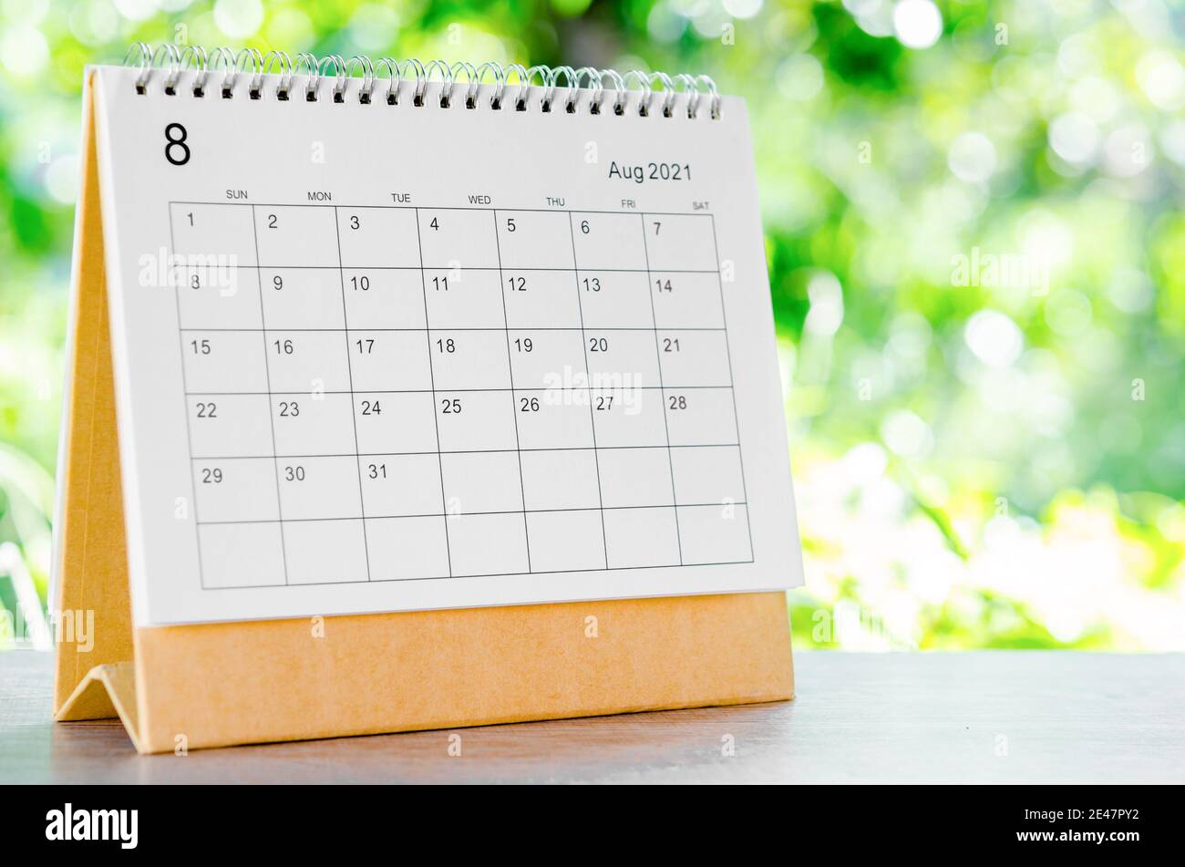 August 2021 Calendar desk for organizer to plan and reminder on wooden ...