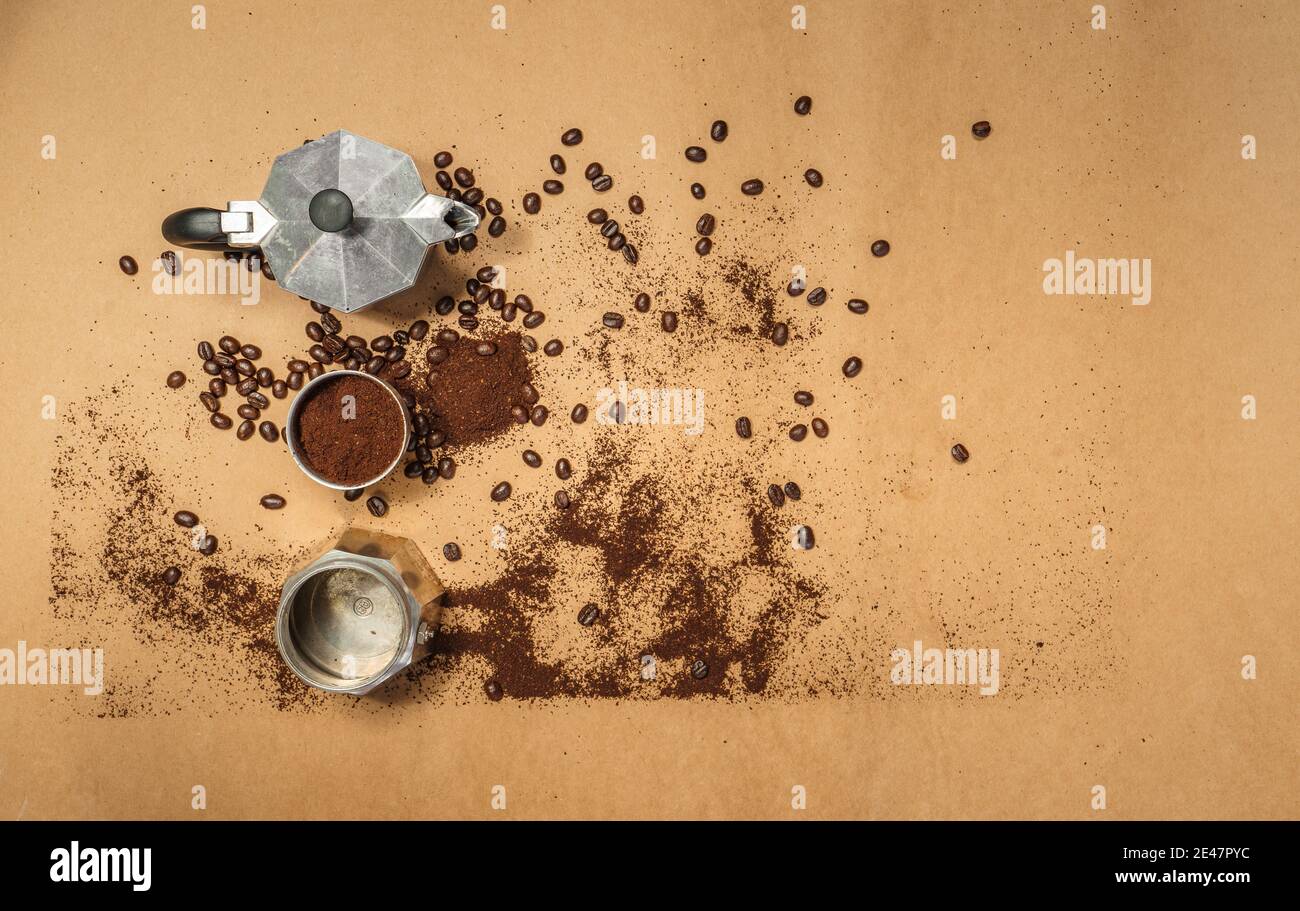 Moka Pot Coffee And coffee beans on brown paper Stock Photo - Alamy