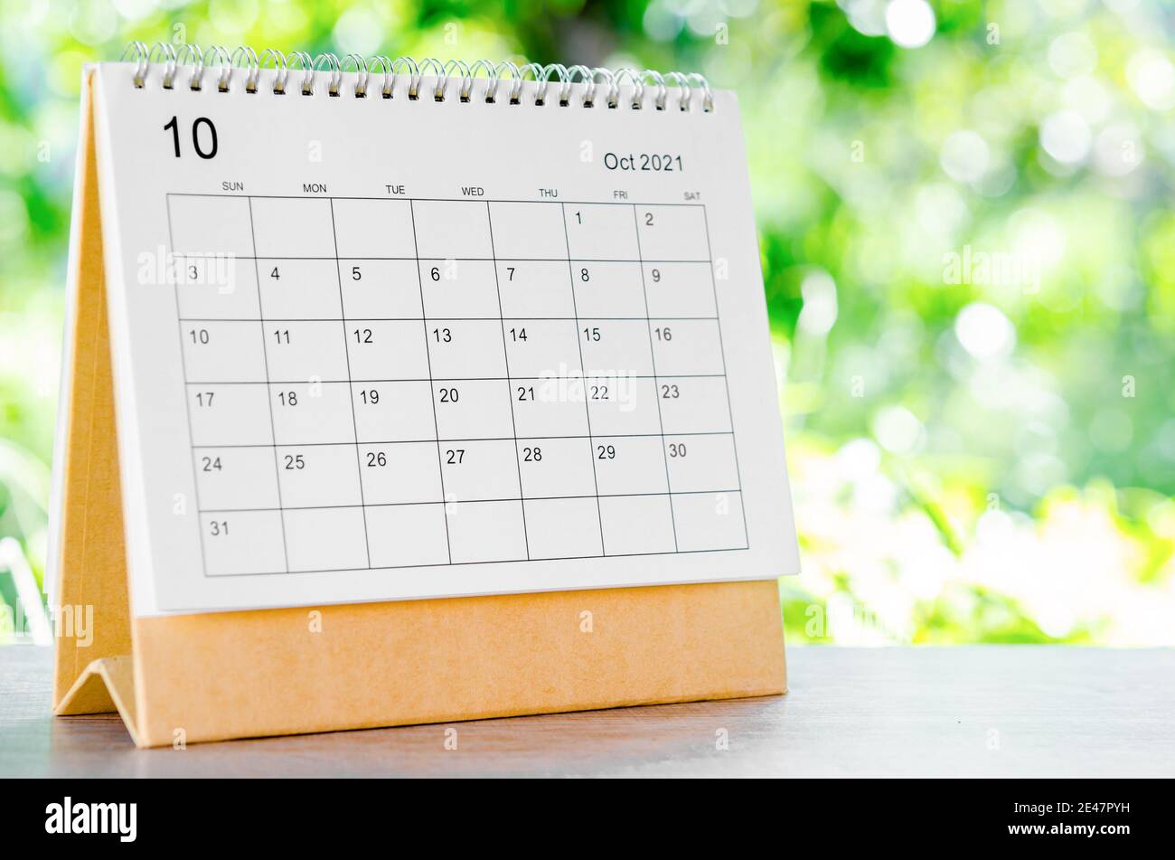 October 2021 Calendar desk for organizer to plan and reminder on wooden ...