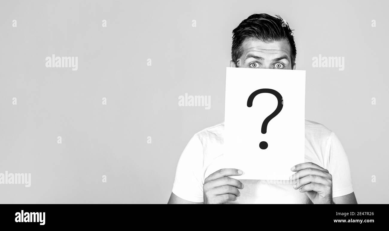 Question Mark. Problems and solutions. Portrait of man, peeking behind ...