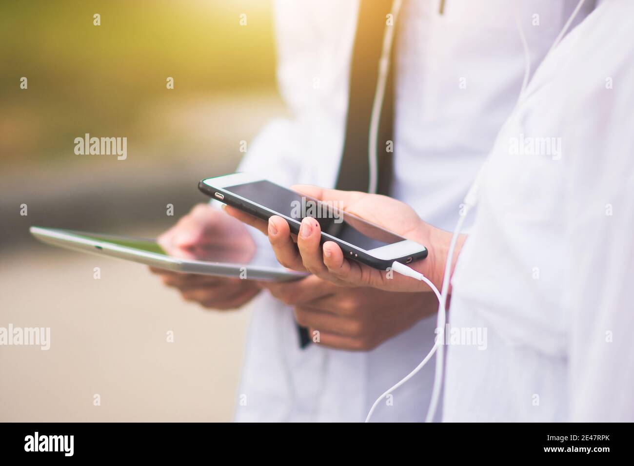 Asian people use mobile smart phone tablet smart technology Stock Photo ...