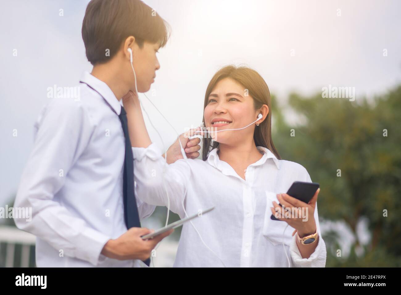 Asian people use mobile smart phone tablet smart technology Stock Photo ...