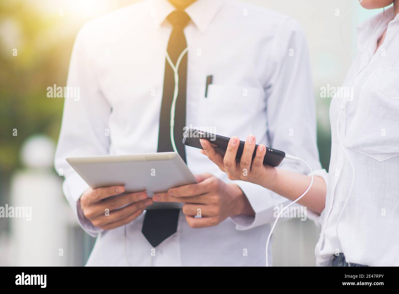 Asian people use mobile smart phone tablet smart technology Stock Photo ...