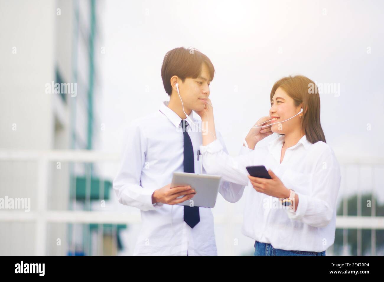 Asian people use mobile smart phone tablet smart technology Stock Photo ...