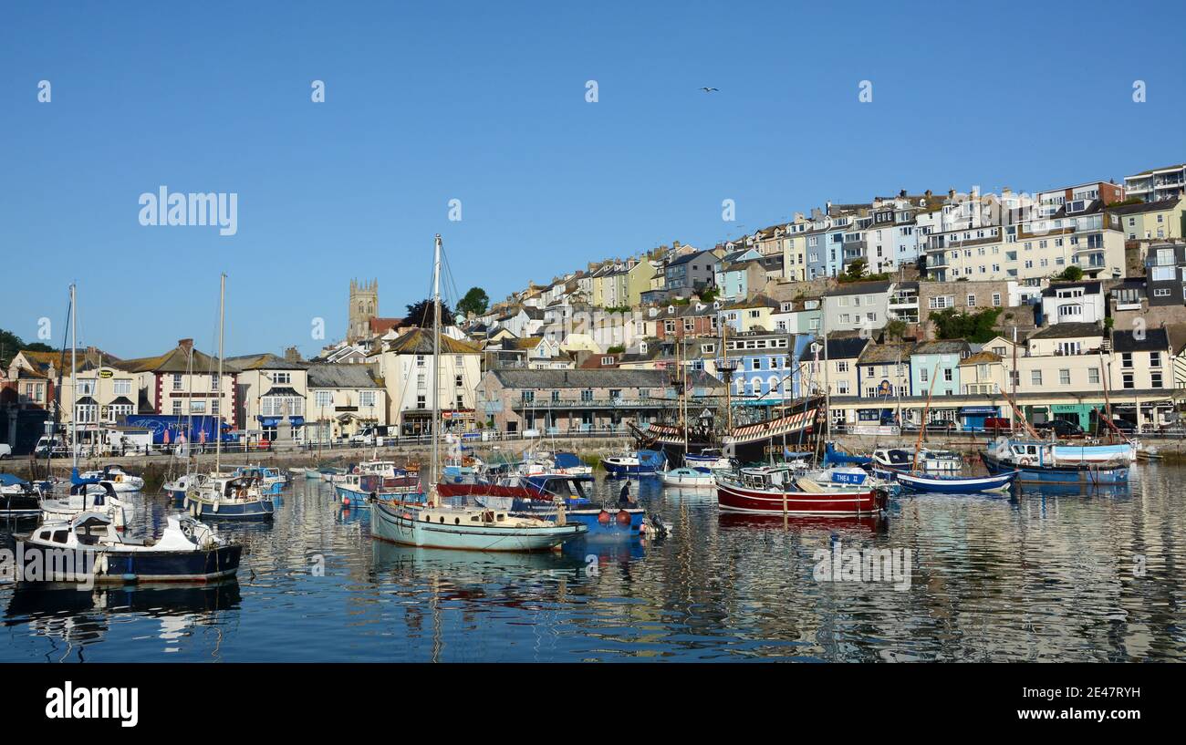 Brixham in Devon, England. An old historic fishing village still with a ...