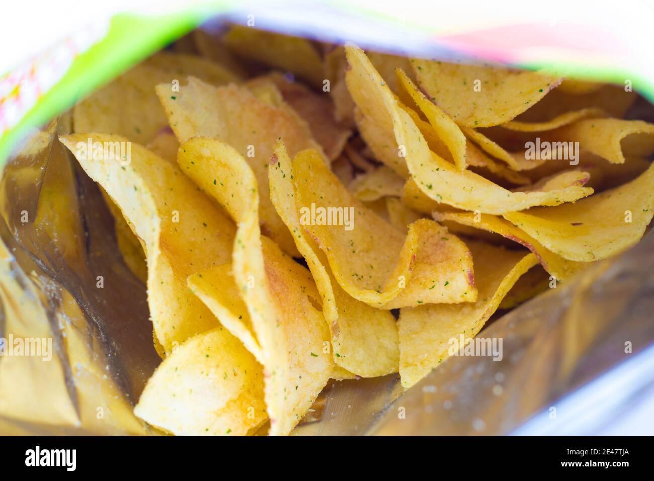 Potato chips is snack in bag ready to eat and fat food or junk food ...