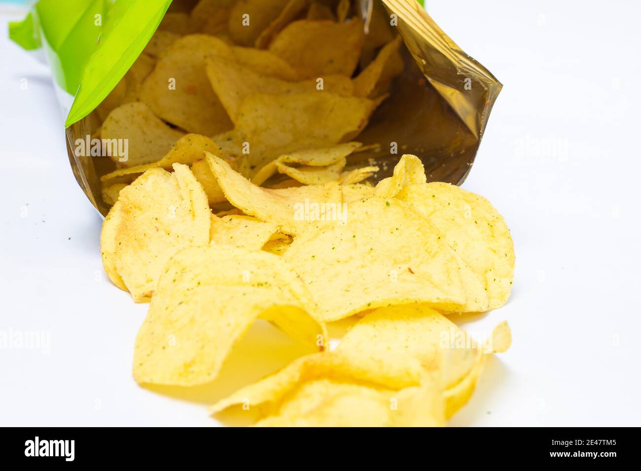 Potato chips is snack in bag ready to eat and fat food or junk food ...