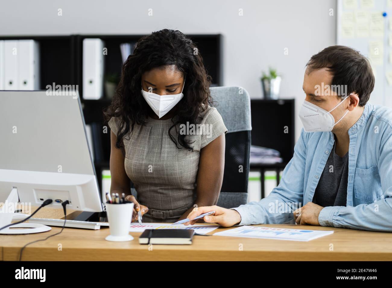 African american male employee wearing hi-res stock photography and ...
