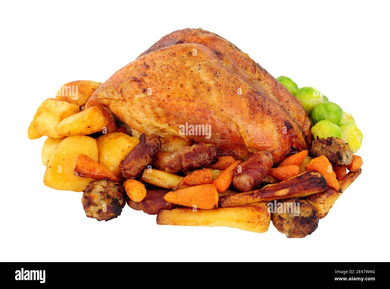 Whole golden roasted turkey crown meat with mixed vegetables and pigs ...