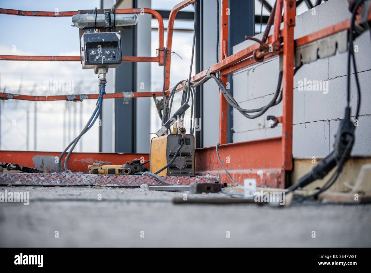 metal crane basket with tools for welding Stock Photo - Alamy