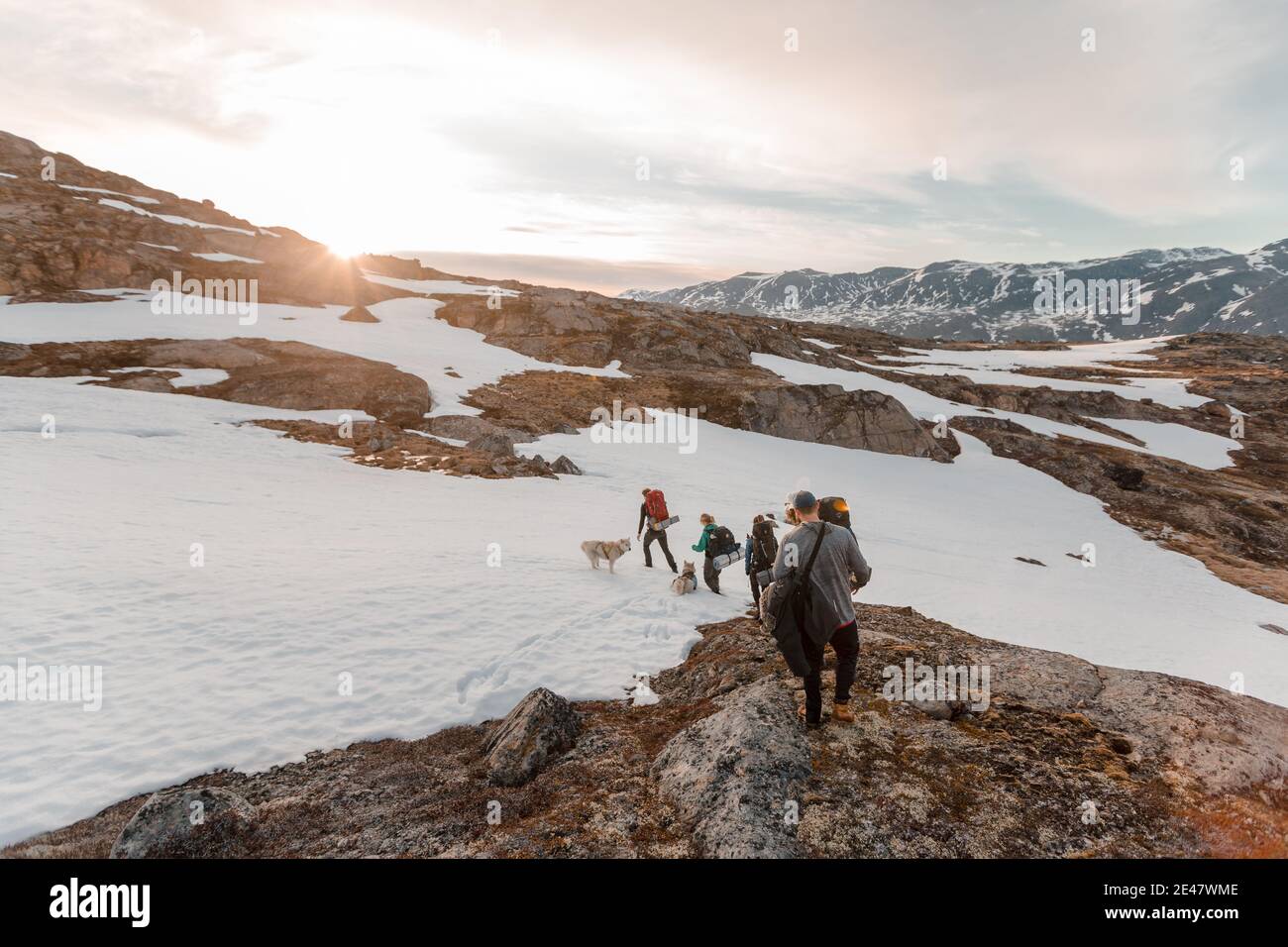 SISIMIUT, DENMARK - May 24, 2020: Group of people hiking in the ...