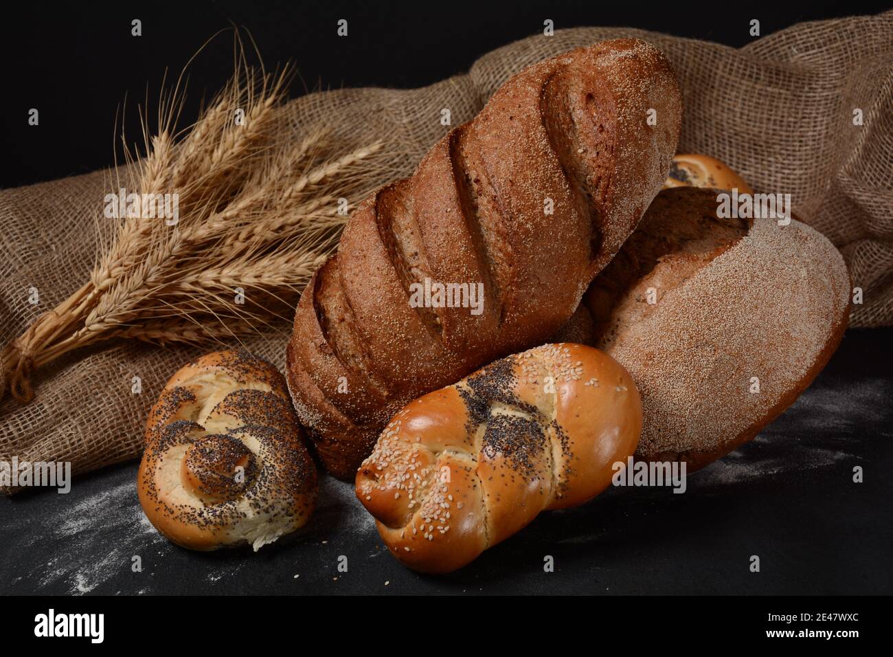 Composition with variety of bread Stock Photo - Alamy