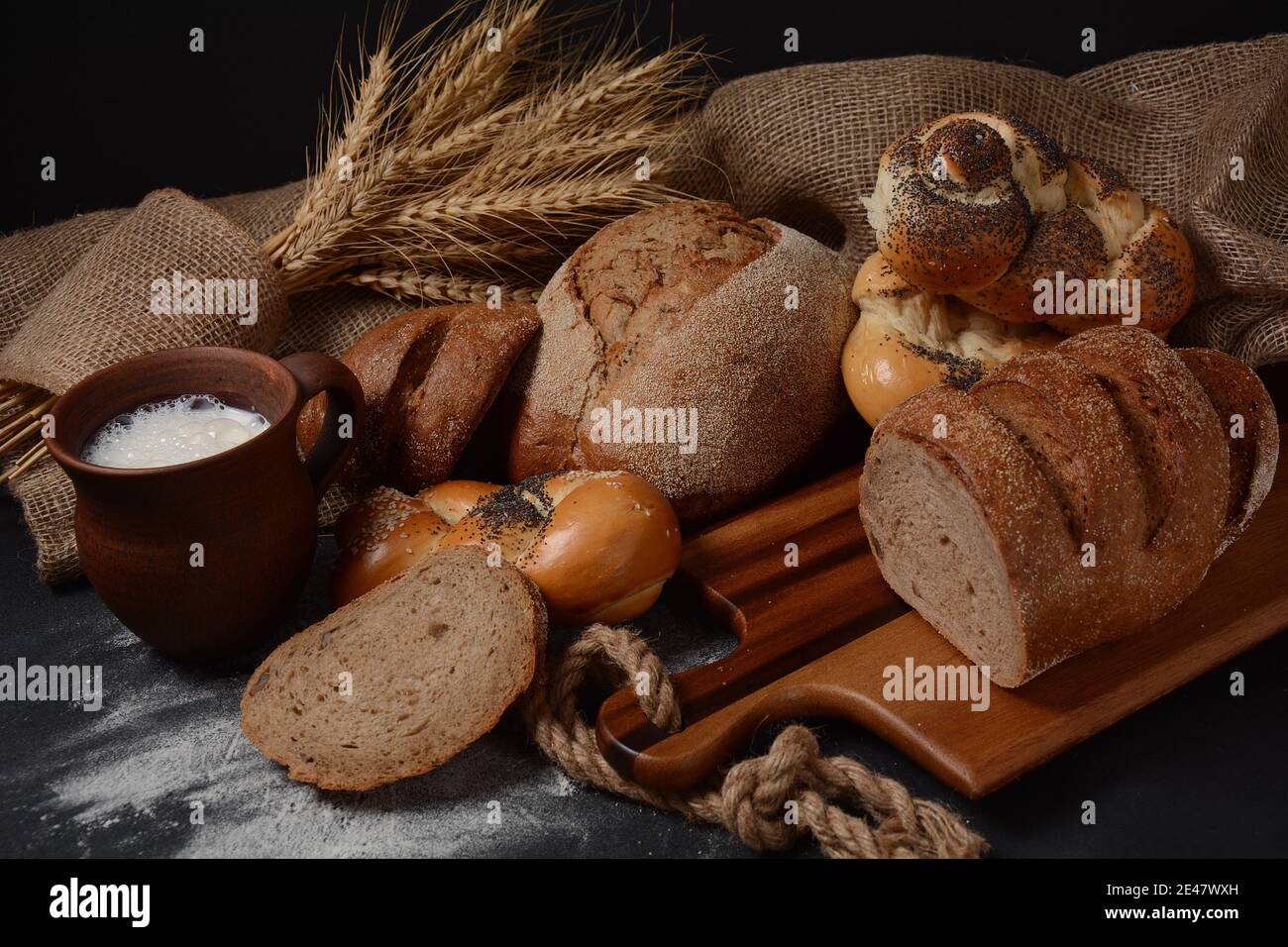 Composition with variety of bread Stock Photo - Alamy